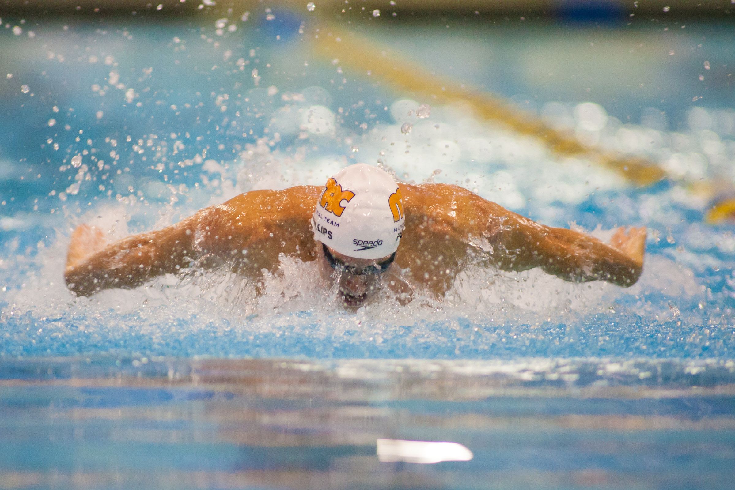 Tim Phillips and Lochte Keep It Close in 100 Fly at Athens