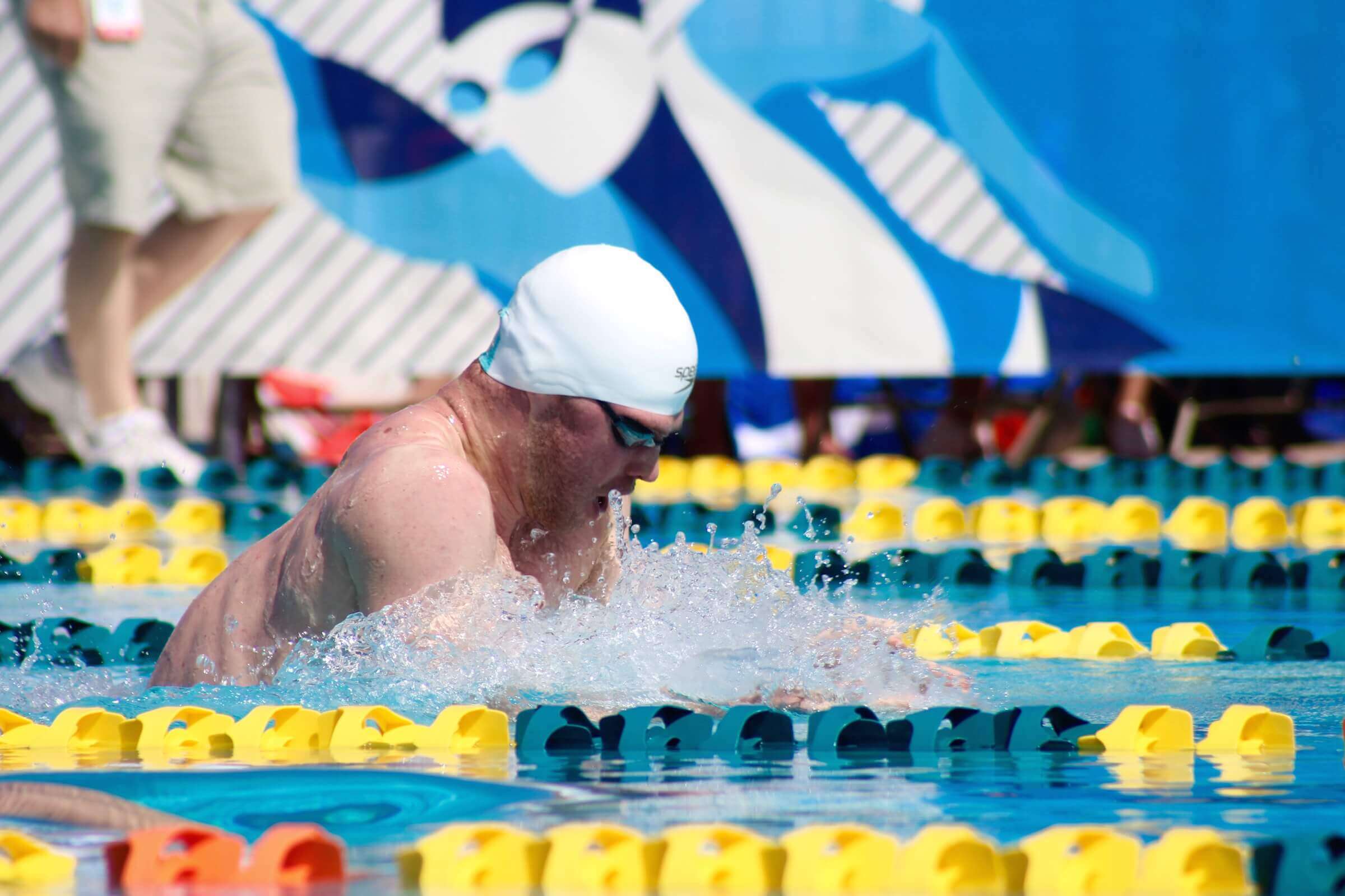 Kevin Cordes Cruises to 100 Breast Gold at Mesa Pro Series - Swimming World