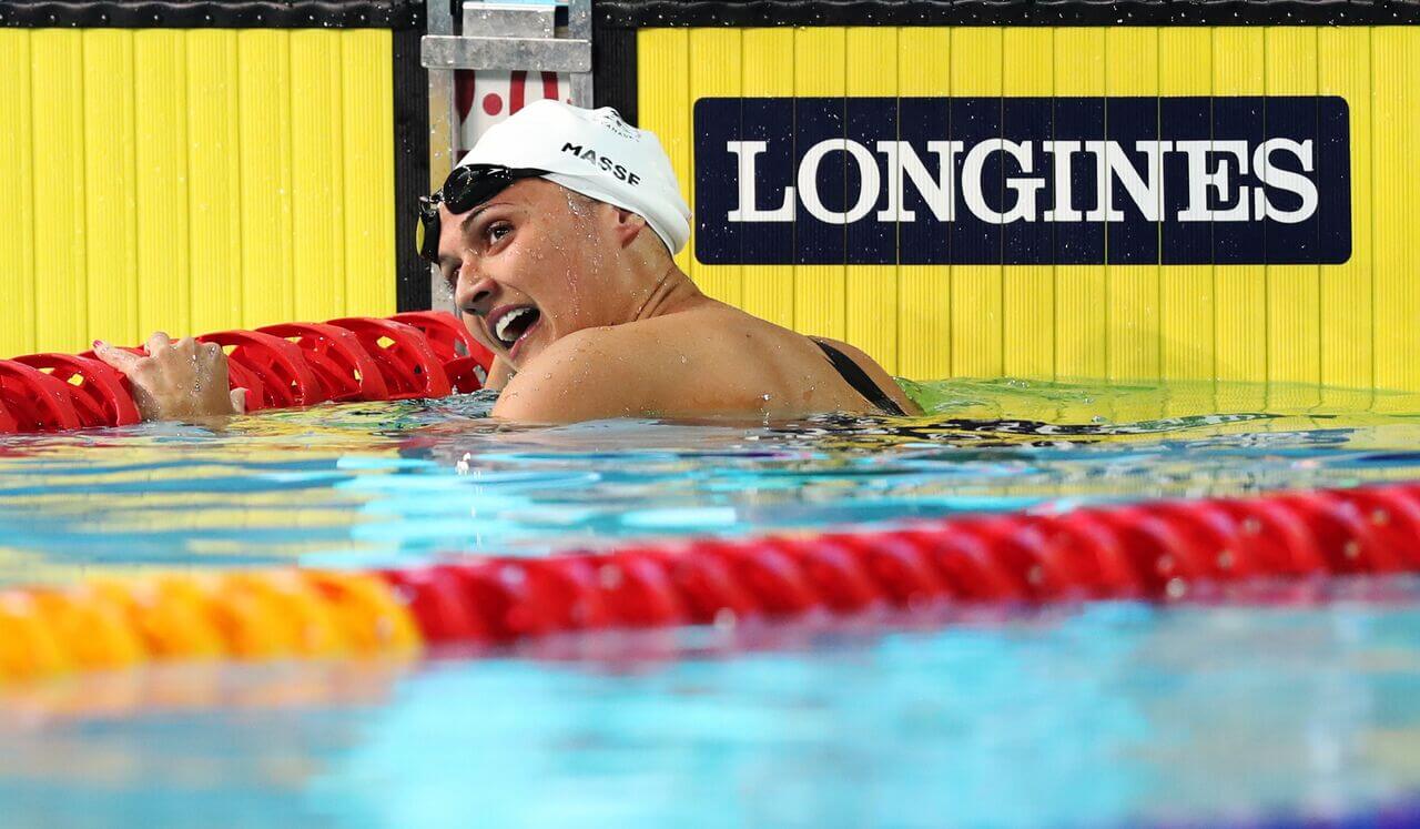 Kylie Masse Holds Off Taylor Ruck To Win 200 Back at Commonwealth Games ...
