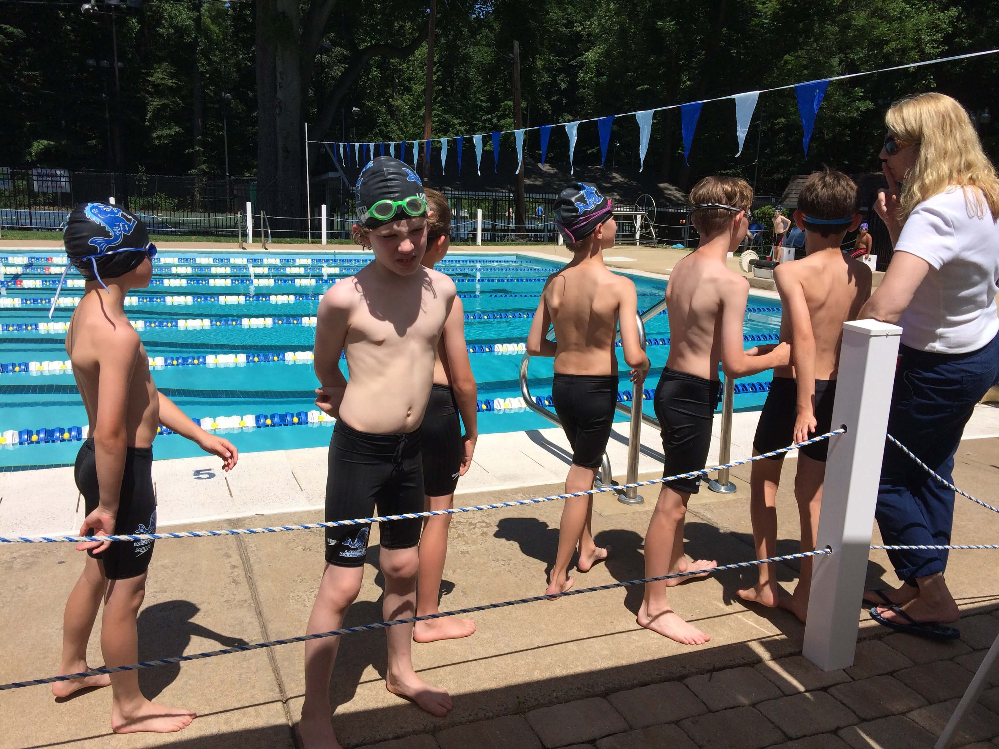 Who Are They: Meet 7 Unsung Swim Meet Heroes