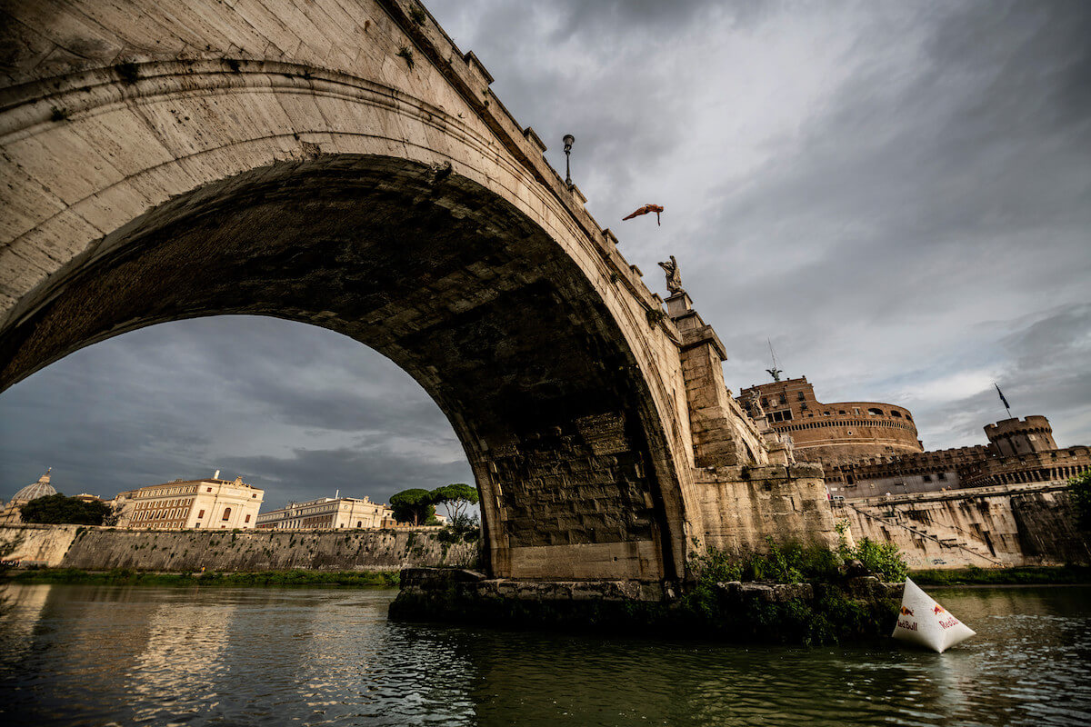 Cliff Divers Leap from Rome's Bridge of Angels Ahead of Season Finale ...