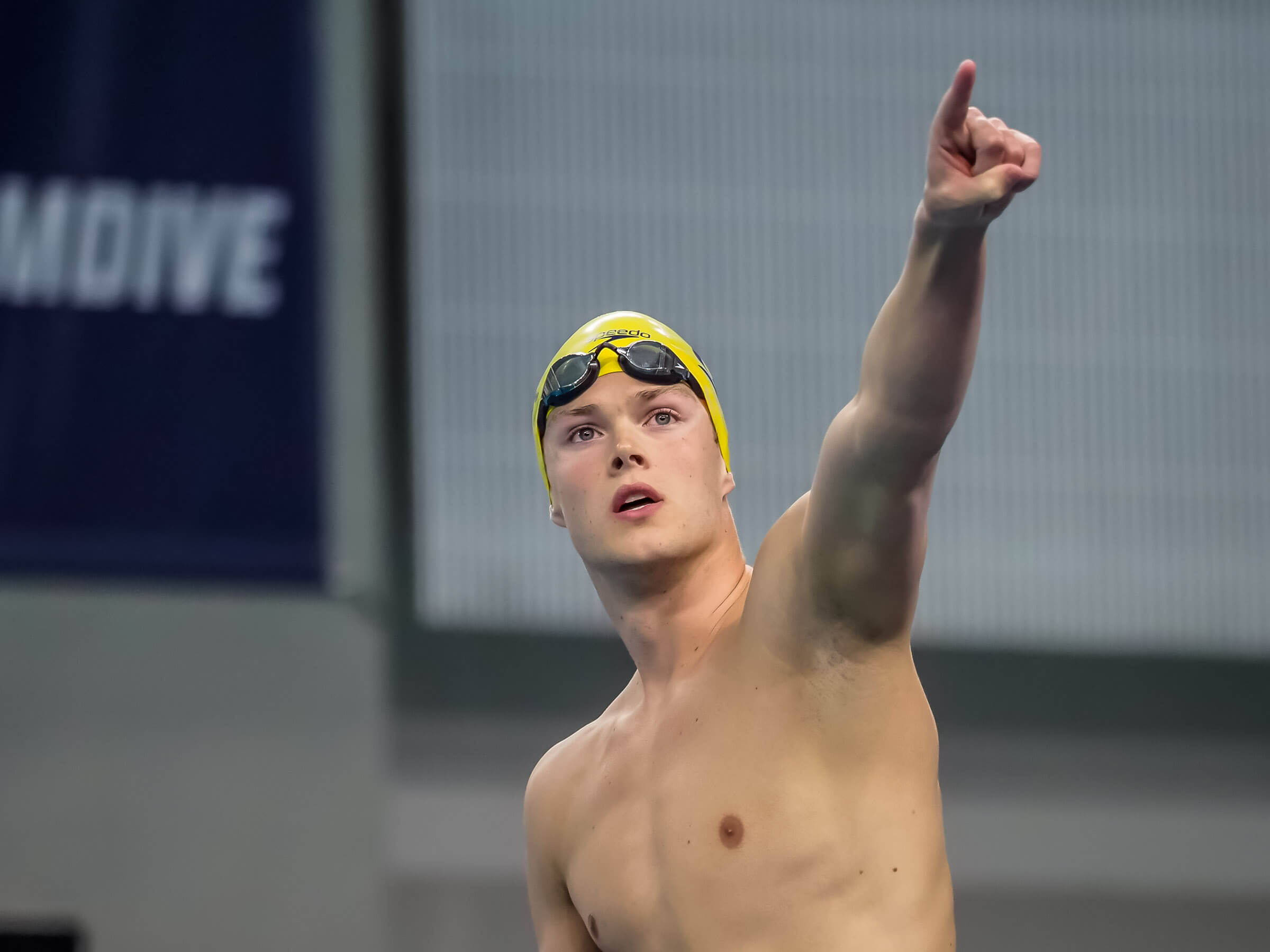 Daniel Carr Triumphantly Re-Swims, Lands Coach Dave Durden on Backside