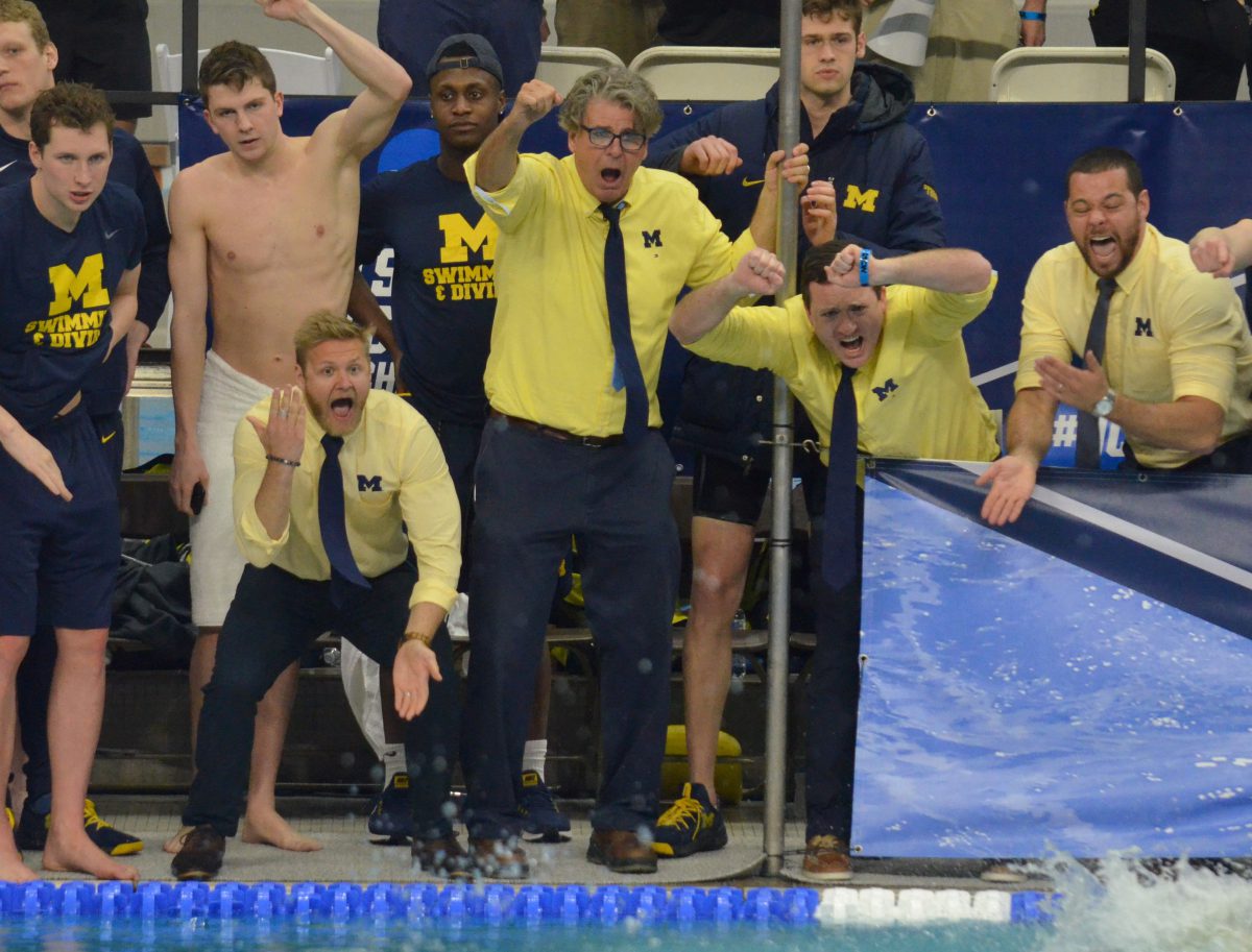 Michigan Swimming Sweeps Rival Michigan State on Senior Night