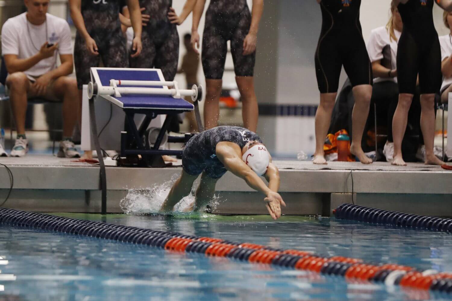 Rhyan White Puts Up 1:49 200 Back; Douglass Breaks 47 100 Free on Final ...