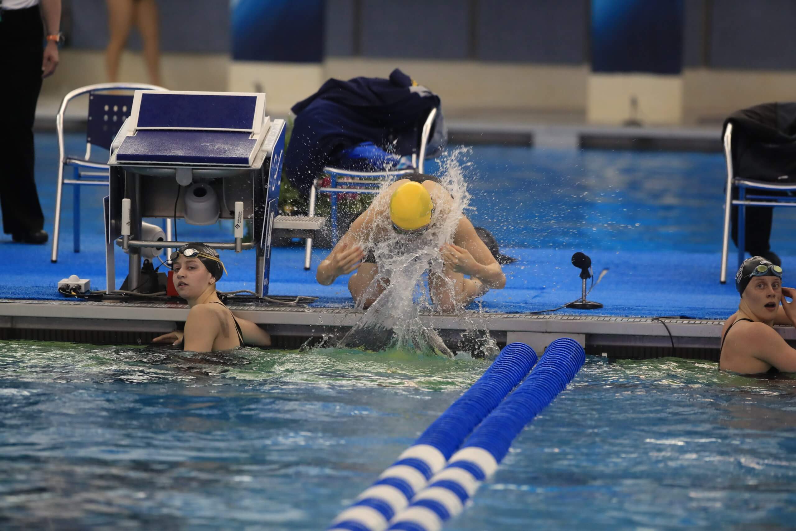 Maggie MacNeil Wins Record-Breaking Round 2 Race With Kate Douglass