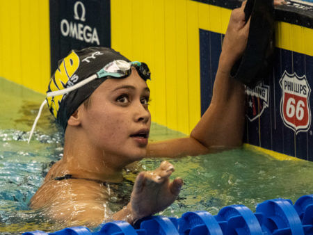 Bella Sims Pops Pair of World Junior Records In 12-Minute Span