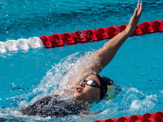 Bella Sims Hits 100 Back A Cut, School Record at Florida Invite