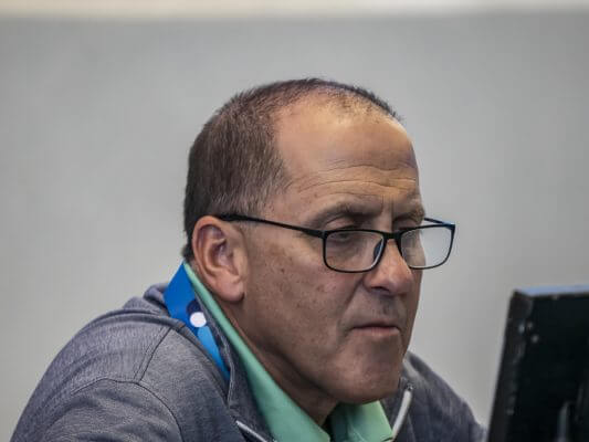 Mike Unger Wins 2026 Ben Franklin Award - Swimming World